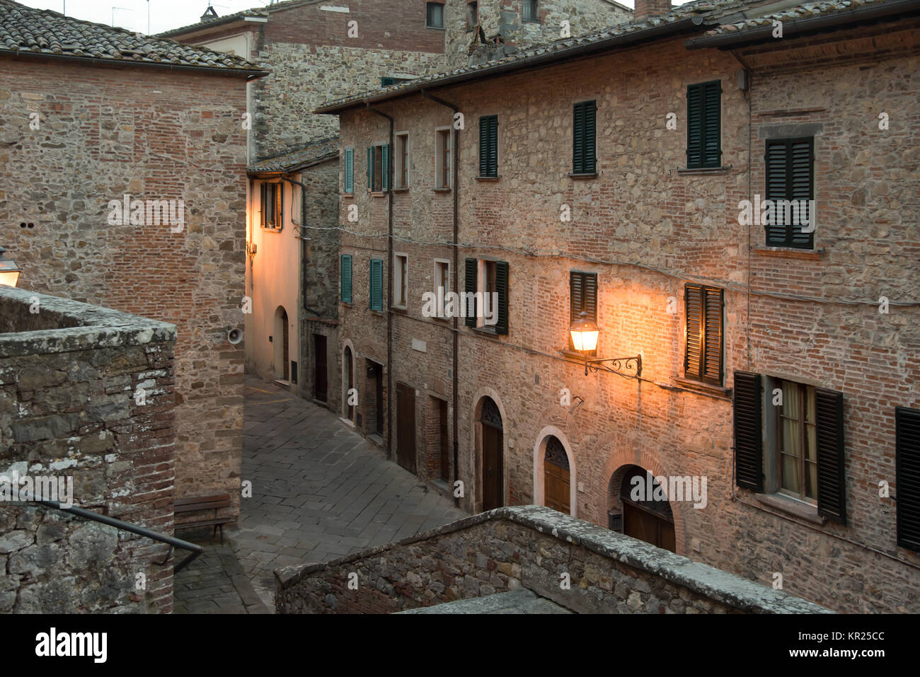 Street view in the beginning twilight in the medieval tuscan town ...
