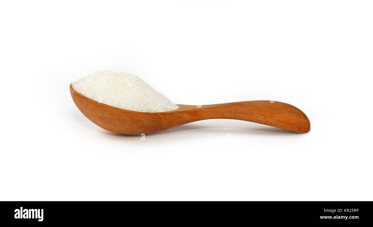 Close up one wooden scoop spoon full of white sugar isolated on white ...