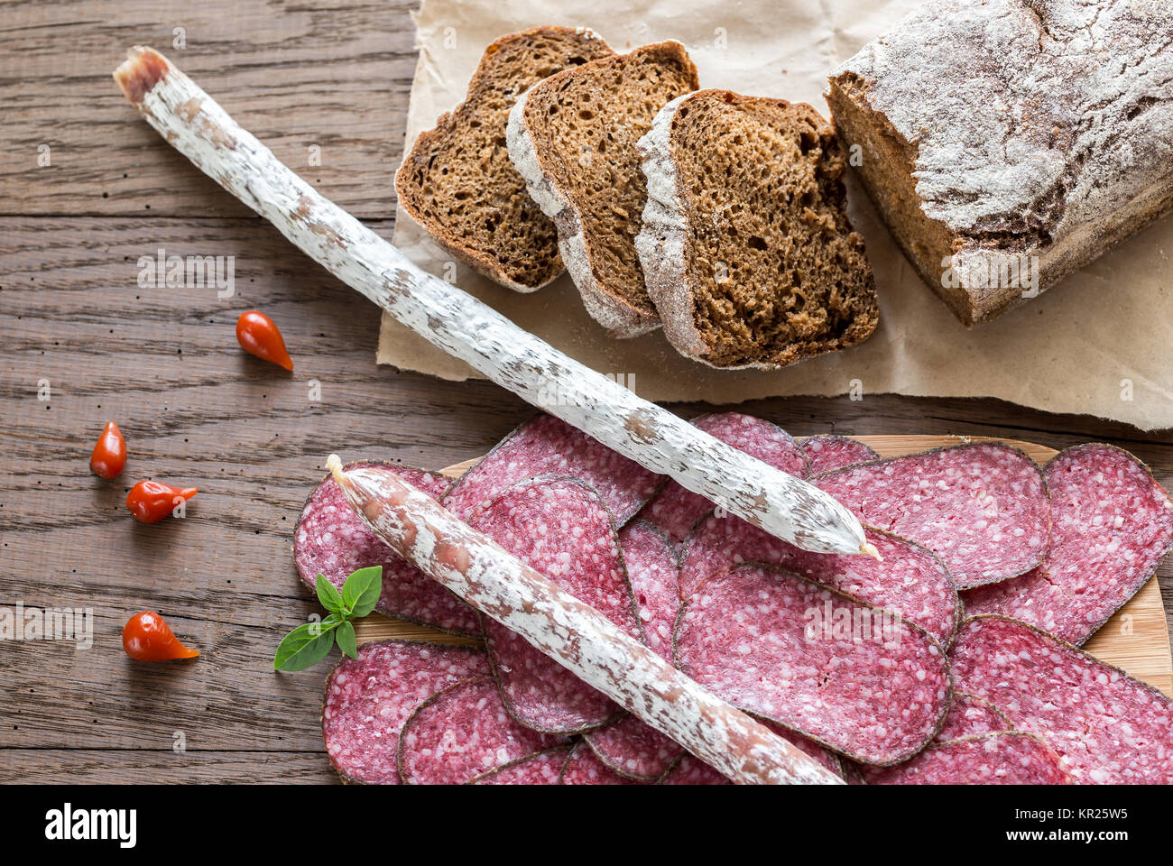 Salami with bread Stock Photo - Alamy