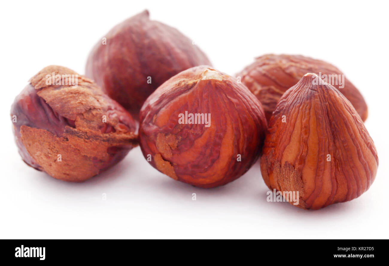 Hazelnut isolated over white background Stock Photo - Alamy