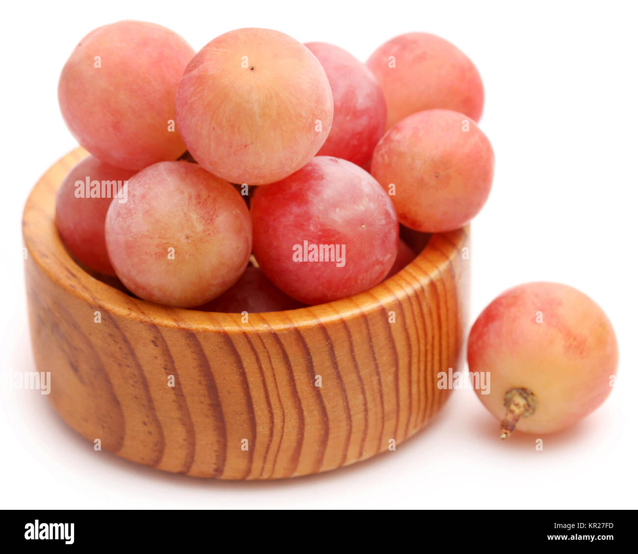 Organic red grapes over white background Stock Photo - Alamy