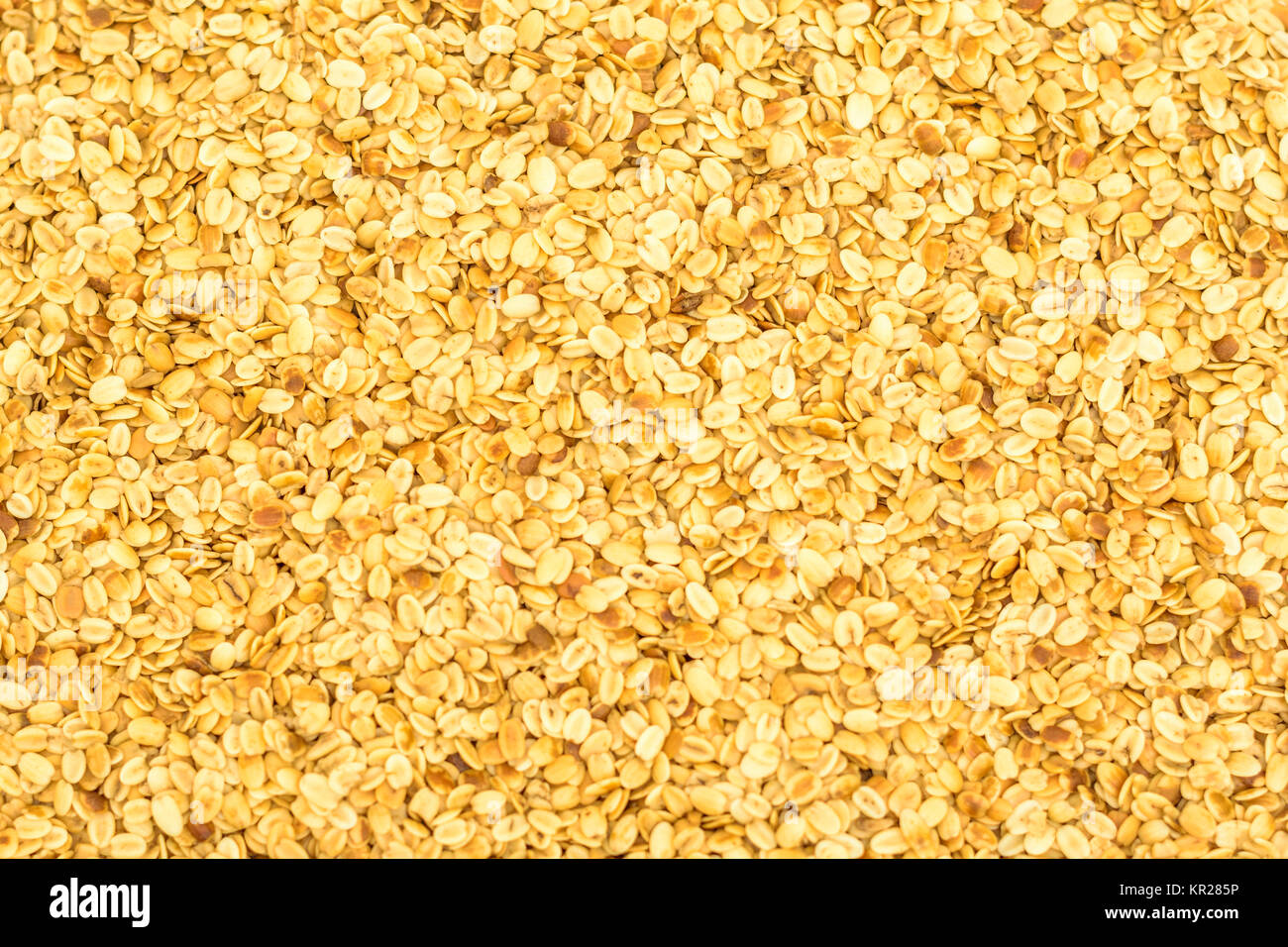 Split roasted coriander seeds - Dhana Dal Stock Photo - Alamy