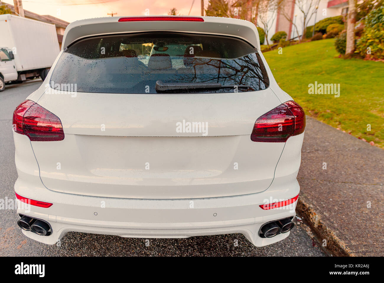 rear view of the car parked in the city, in the afternoon, in the ...