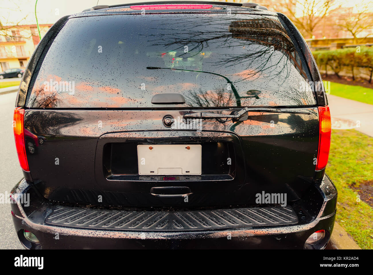 rear view of the car parked in the city, in the afternoon, in the ...