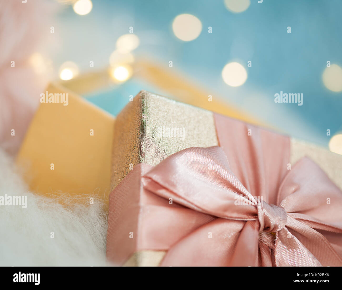 Golden gift box with ribbon Stock Photo - Alamy