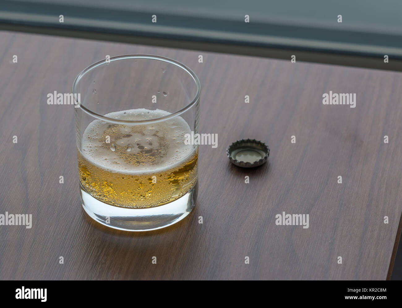 Beer on Short Glass on Wooden Table Stock Photo - Alamy
