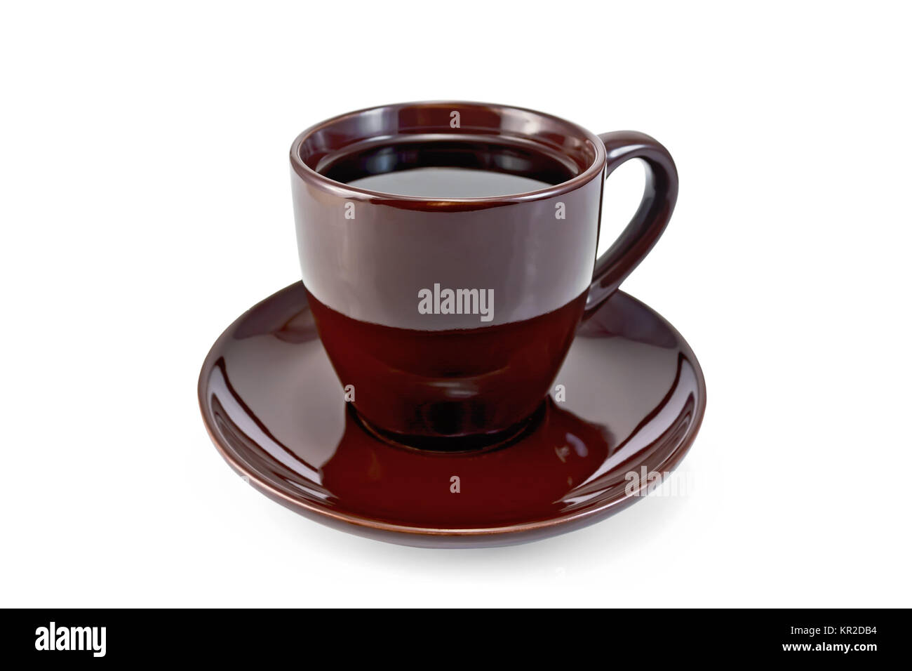 Coffee in brown cup on saucer Stock Photo - Alamy