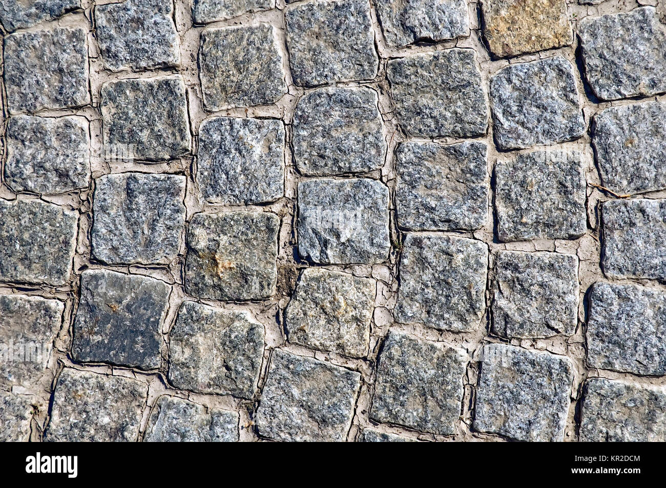 Pavement of granite square tiles Stock Photo - Alamy