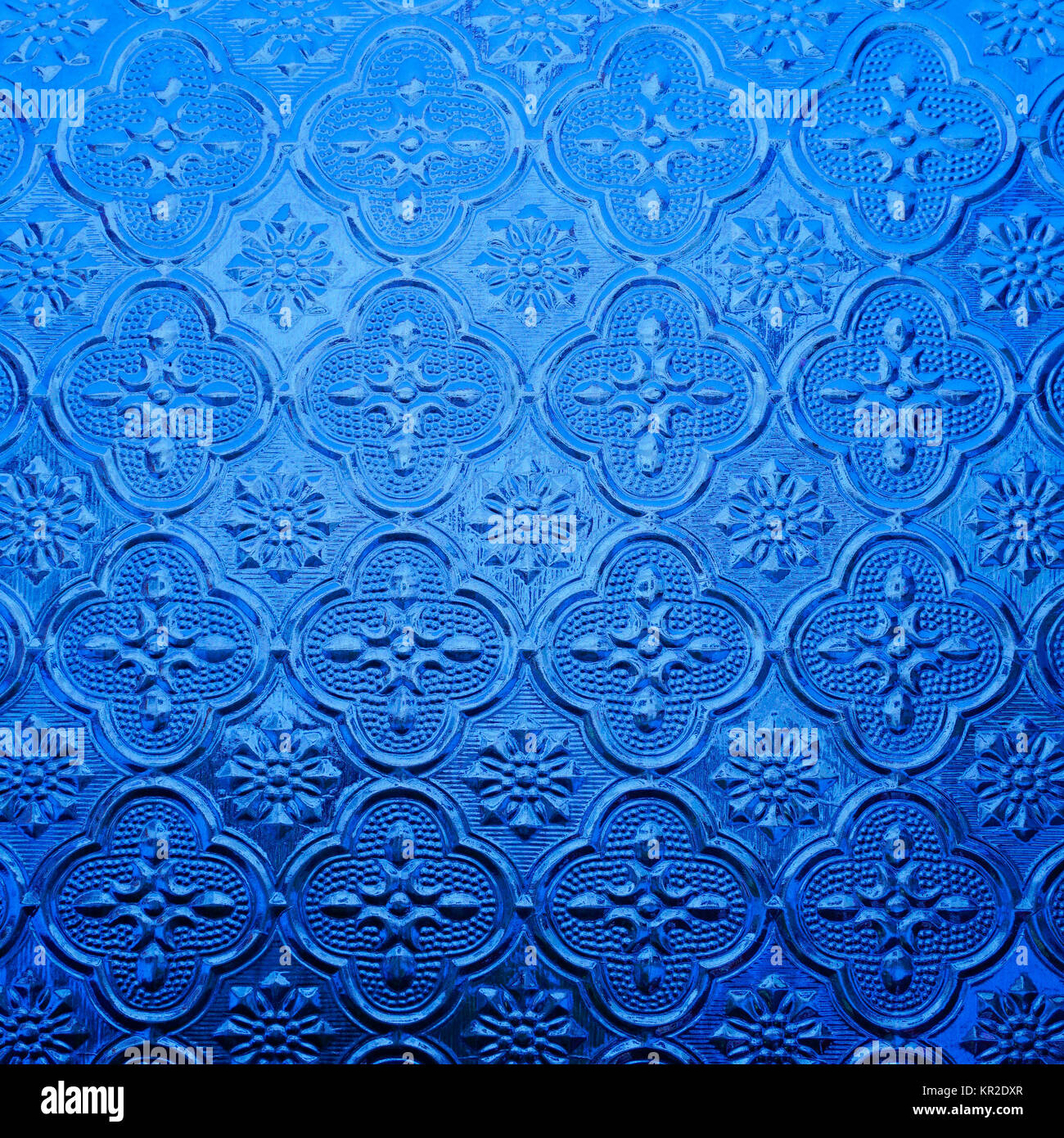 blue color glass with thai pattern Stock Photo - Alamy