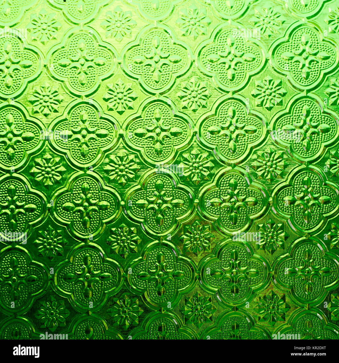 green color glass with thai pattern Stock Photo - Alamy