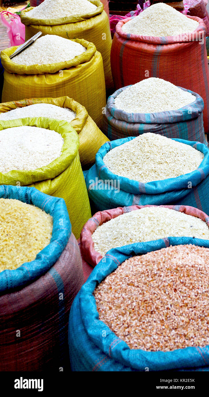 Rice in colorful sack Stock Photo - Alamy