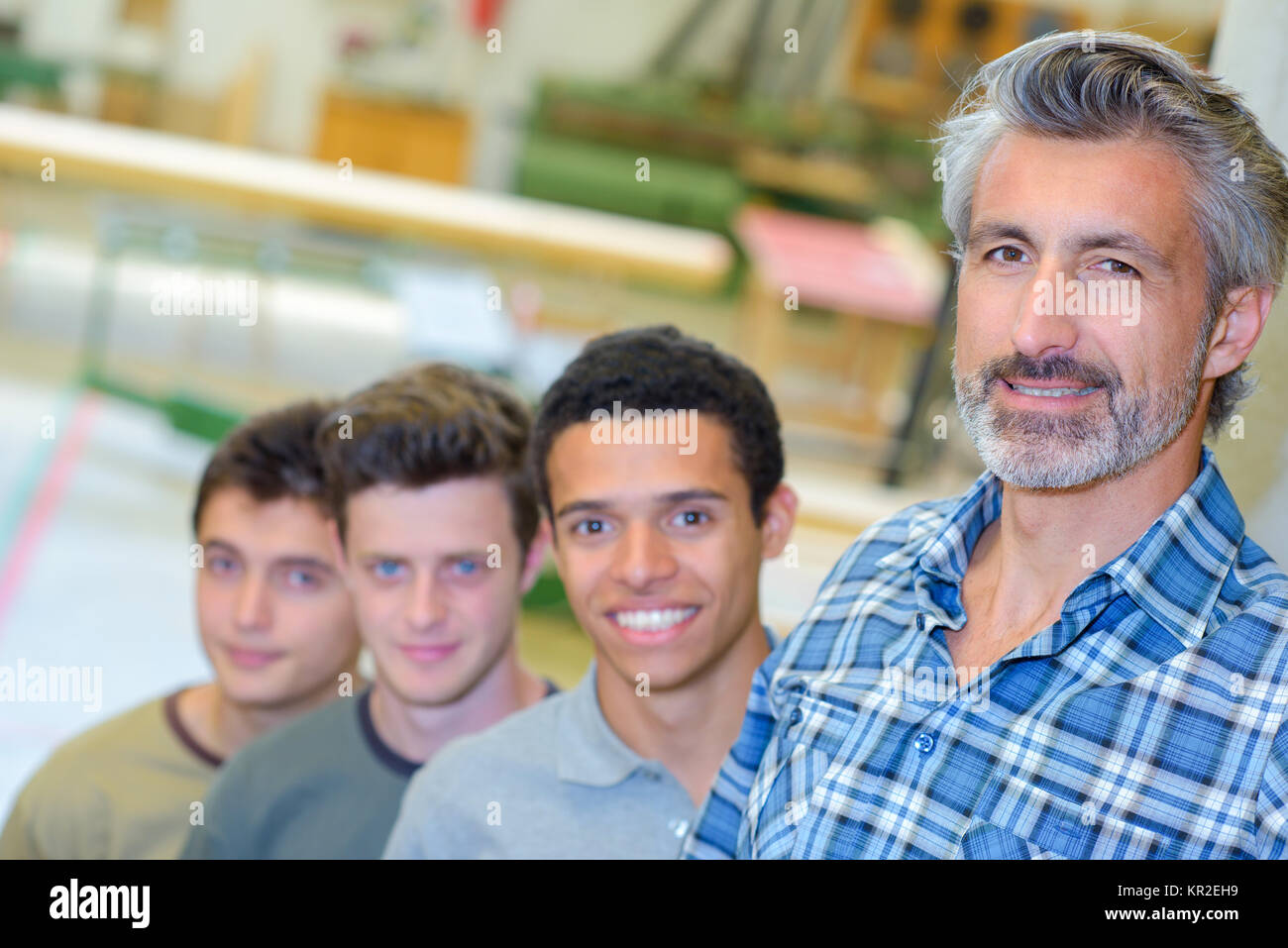 men on a row Stock Photo - Alamy