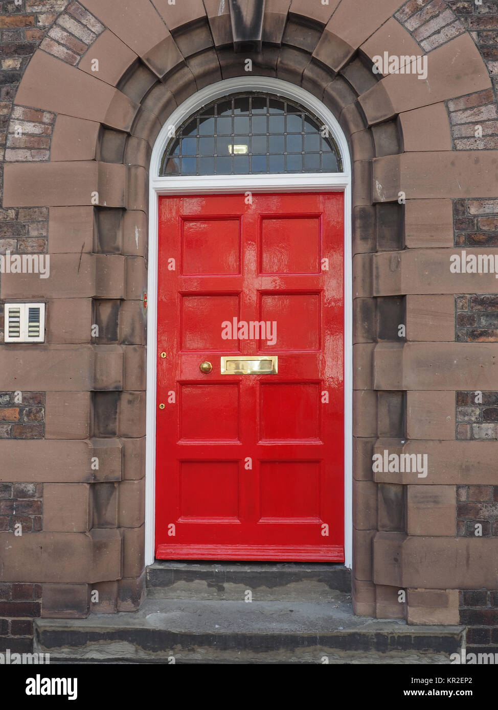Red British door Stock Photo - Alamy