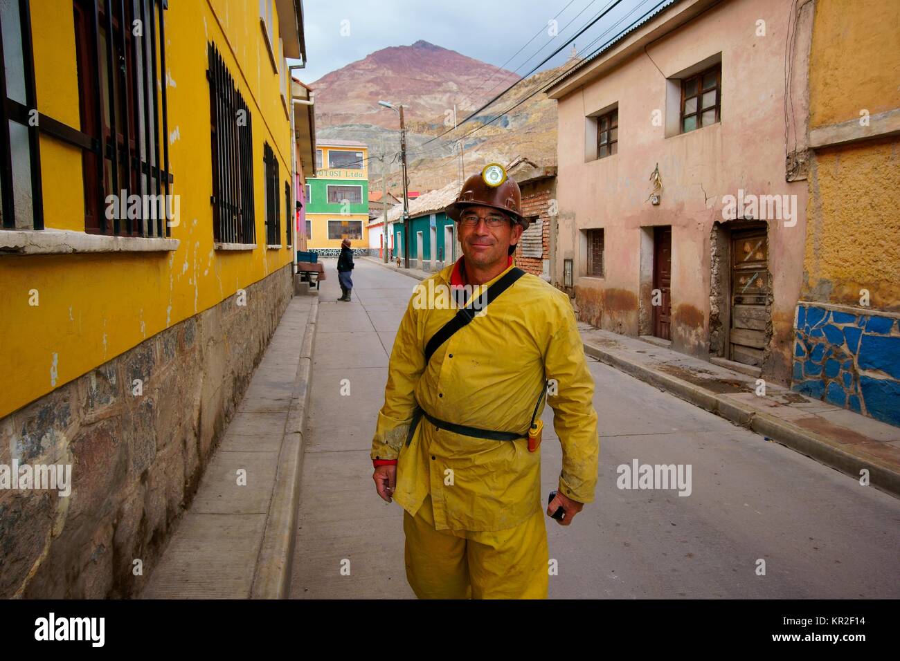 Tourist in protective clothing, mine-tour in the Silver Mountain Cerro ...