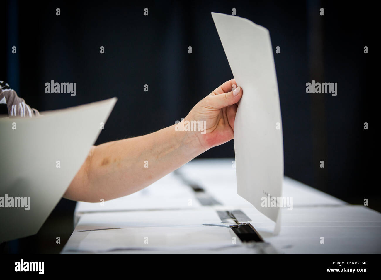Voting hand detail Stock Photo - Alamy