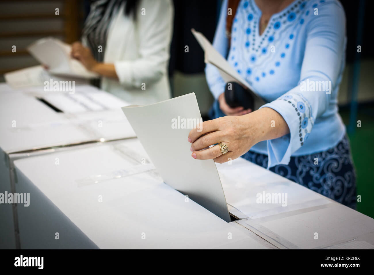 Voting hand detail Stock Photo - Alamy