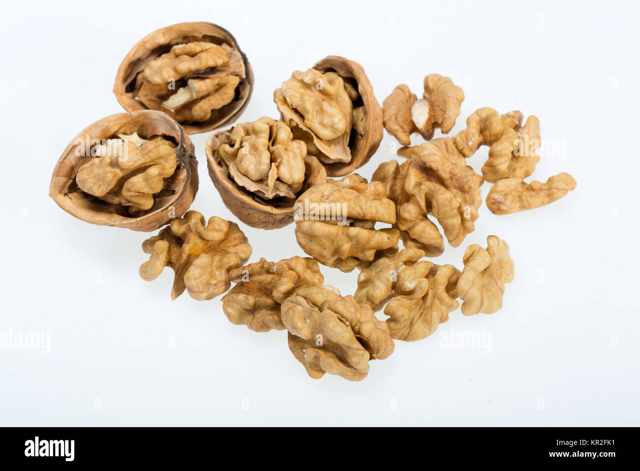 cracked walnut isolated on the white background Stock Photo - Alamy