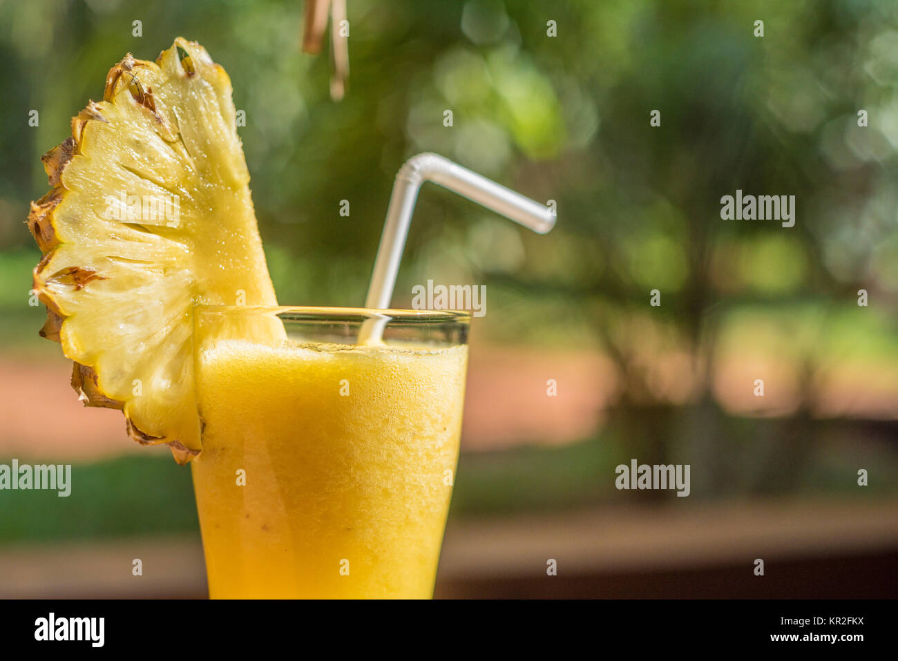 Fresh pineapple juice Stock Photo - Alamy