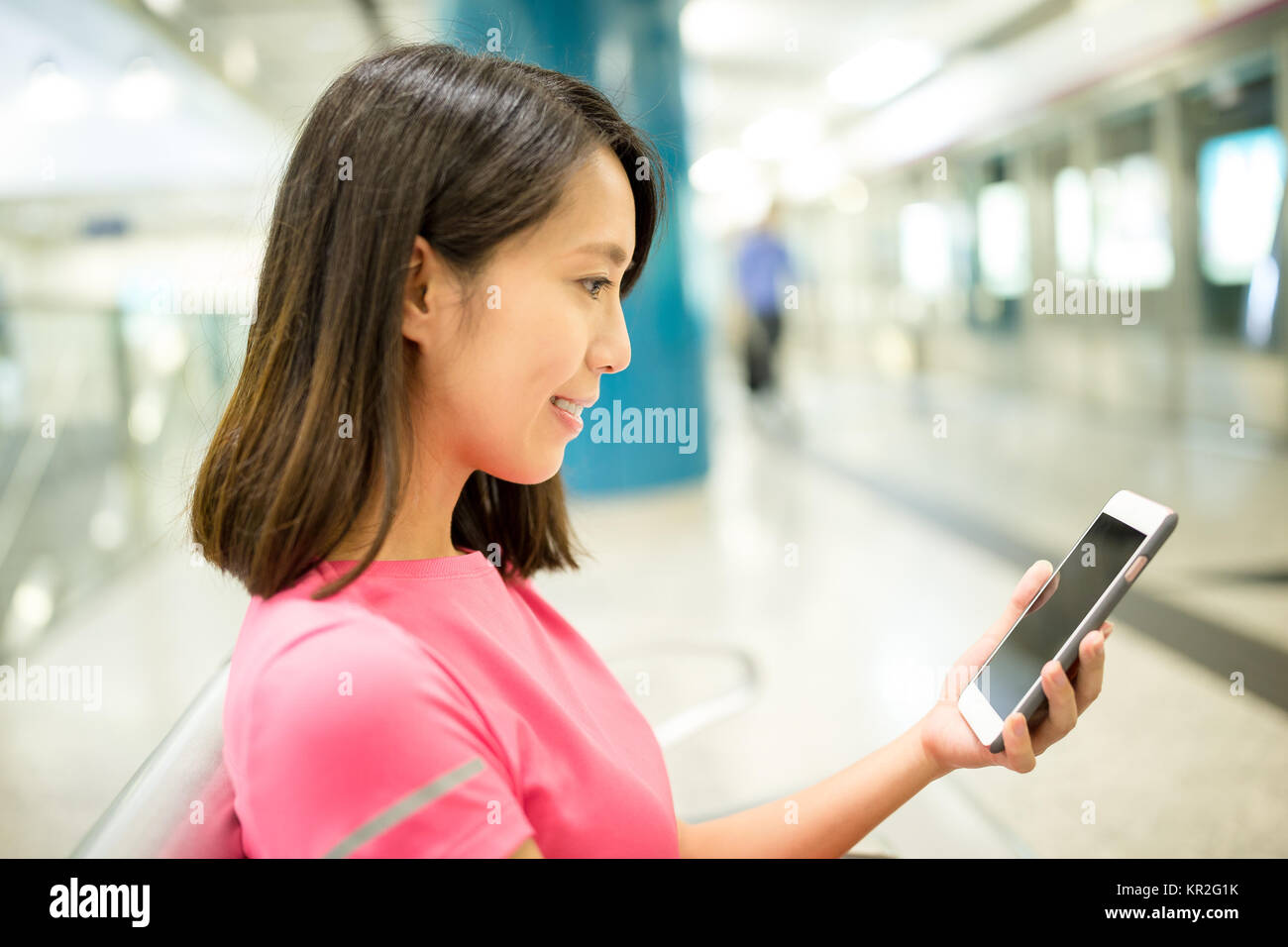 Woman watching on cellphone Stock Photo - Alamy