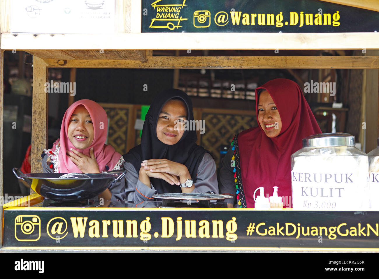 Young women with headscarf, locals in Warung, Malang, Java, Indonesia ...