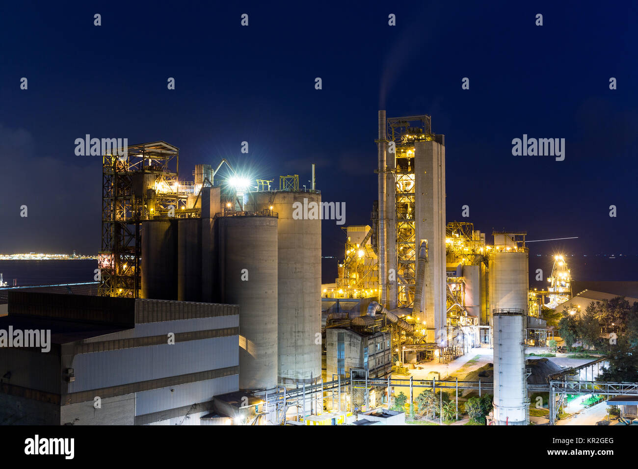 Cement plant at night Stock Photo - Alamy