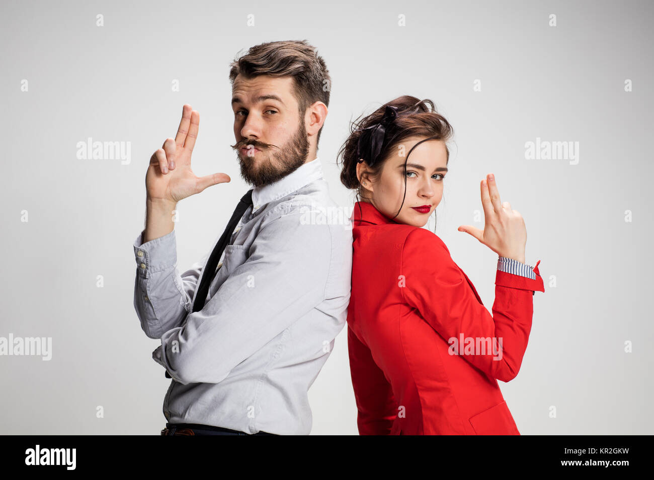 The militant business man and woman Stock Photo - Alamy