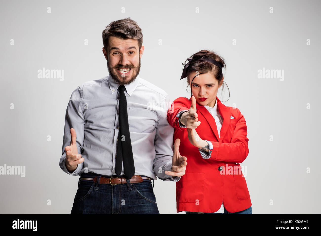 The militant business man and woman Stock Photo - Alamy