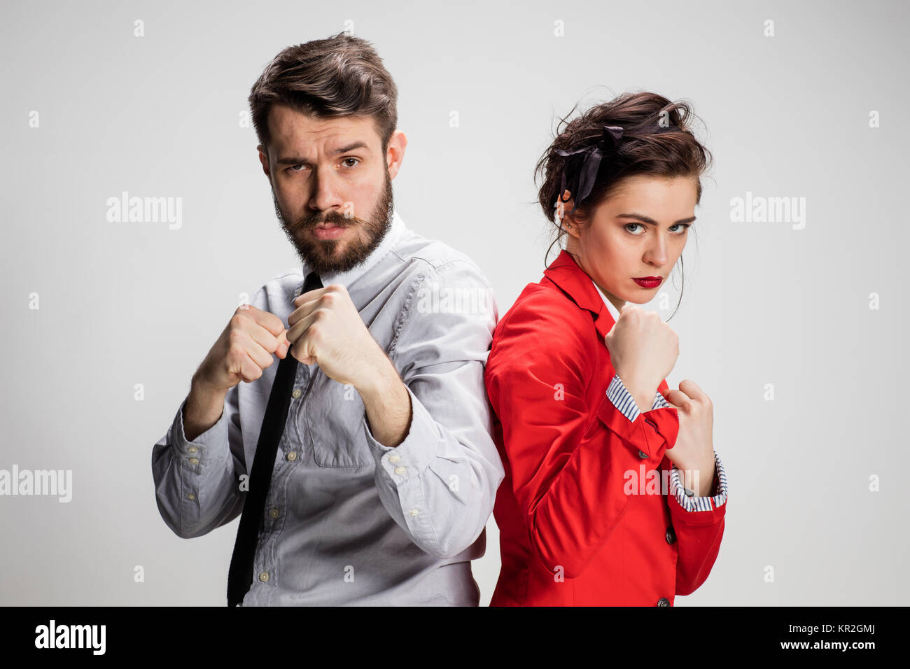 The militant business man and woman Stock Photo - Alamy