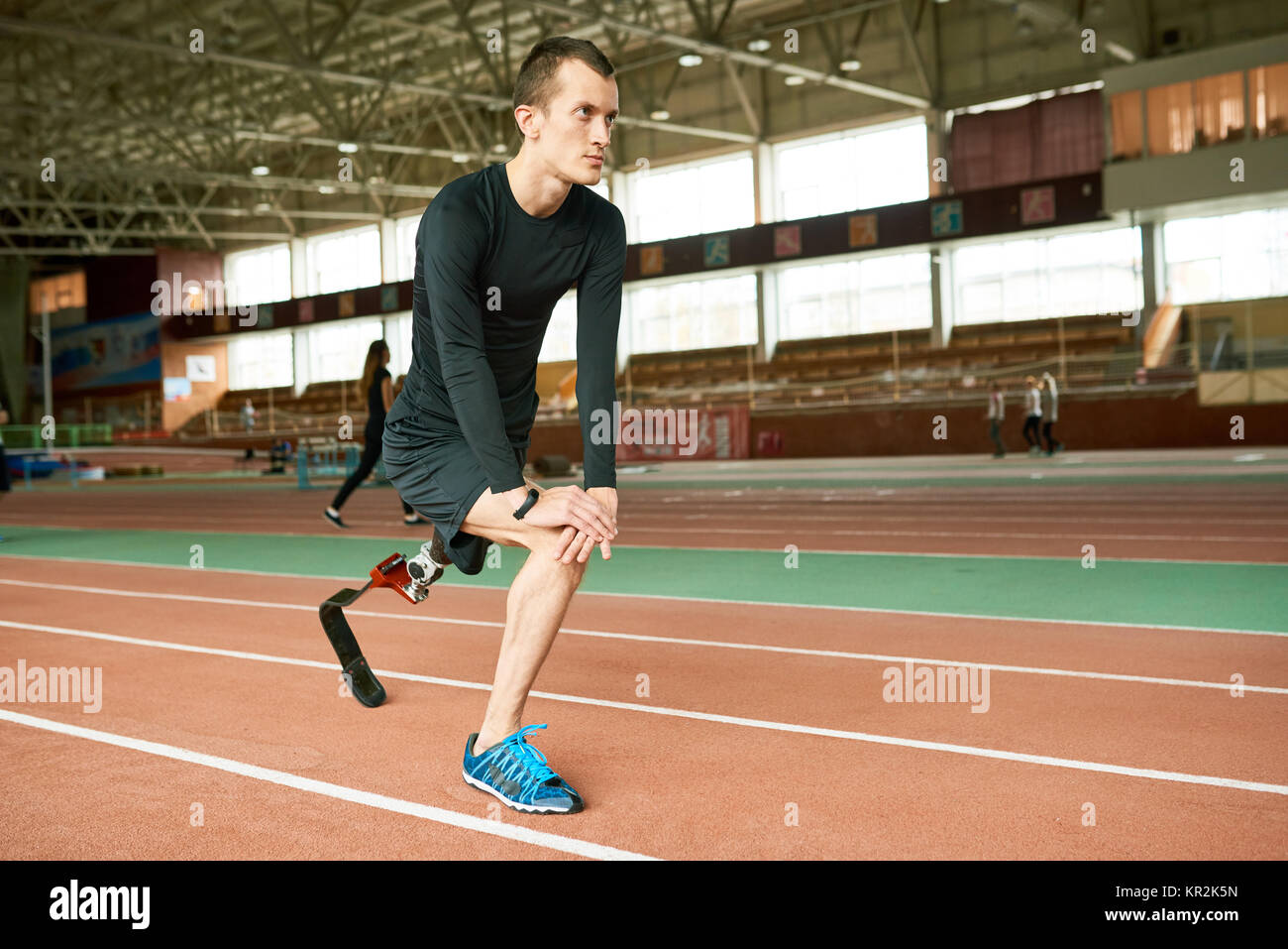 Sprinter stretching hi-res stock photography and images - Alamy