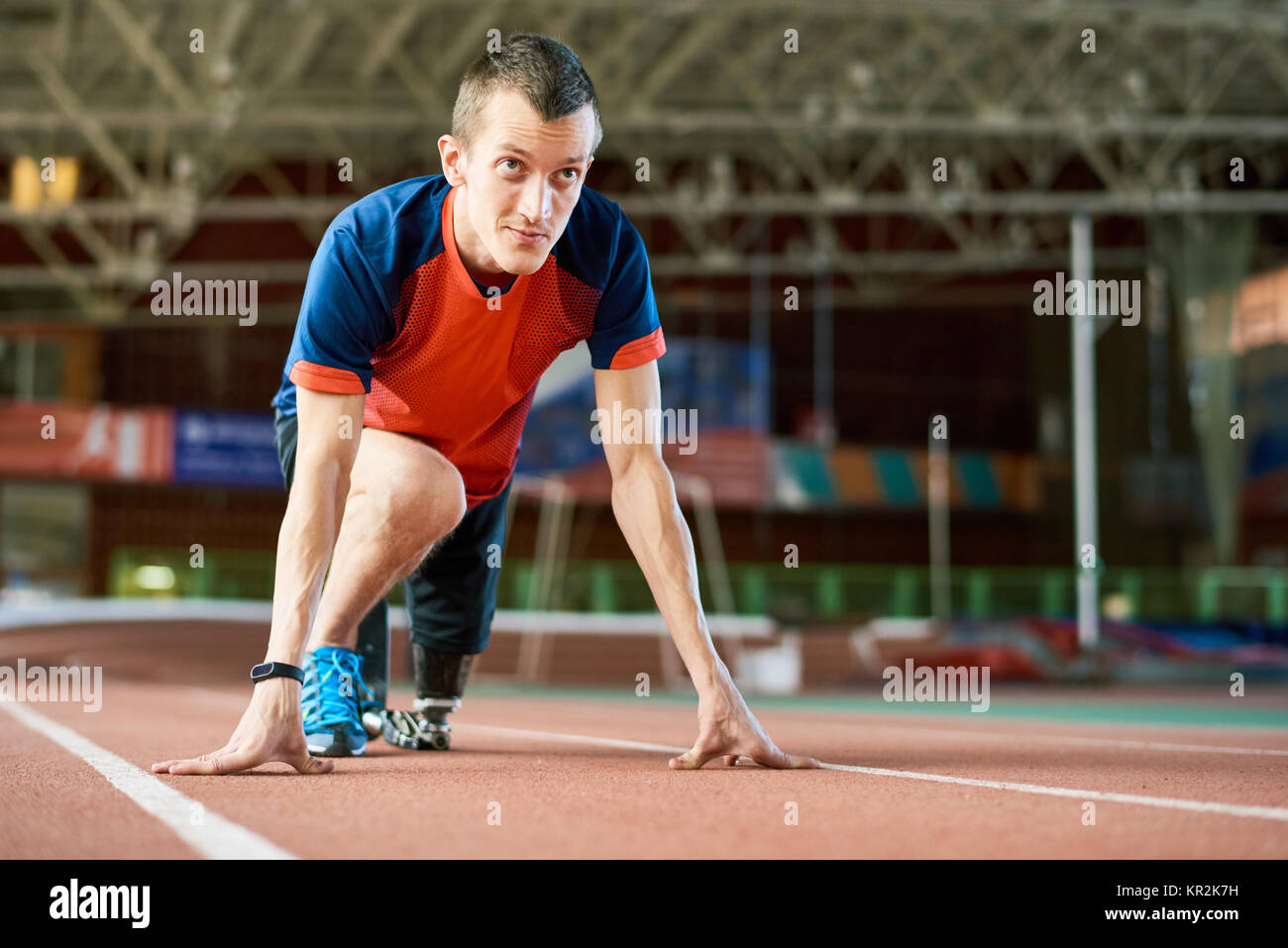 Handicapped Runner on Start Stock Photo - Alamy