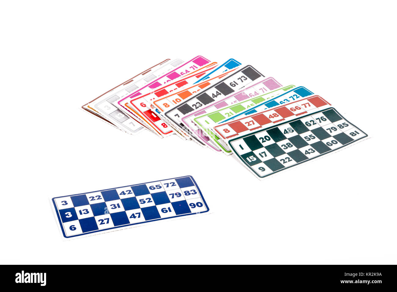 Colorful lotto or bingo game papers with numbers and plastic lotto ...