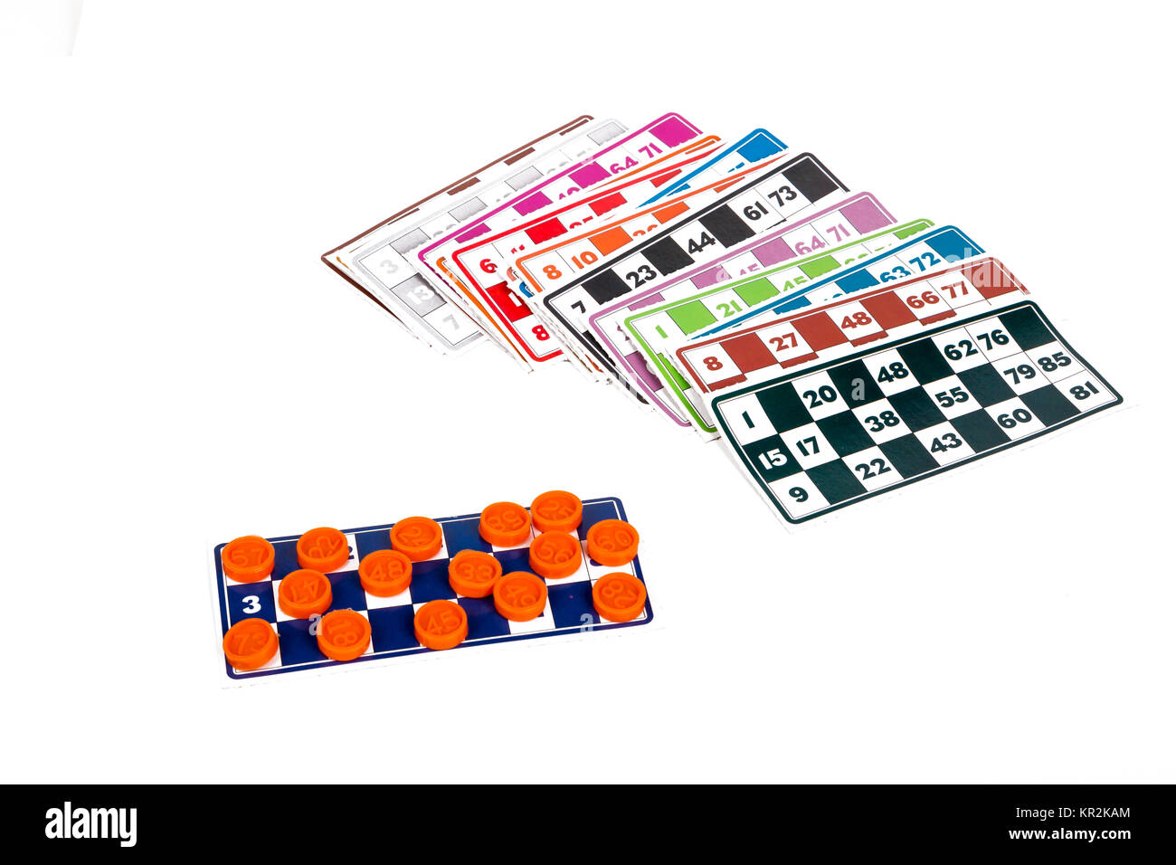 Colorful lotto or bingo game papers with numbers and plastic lotto ...
