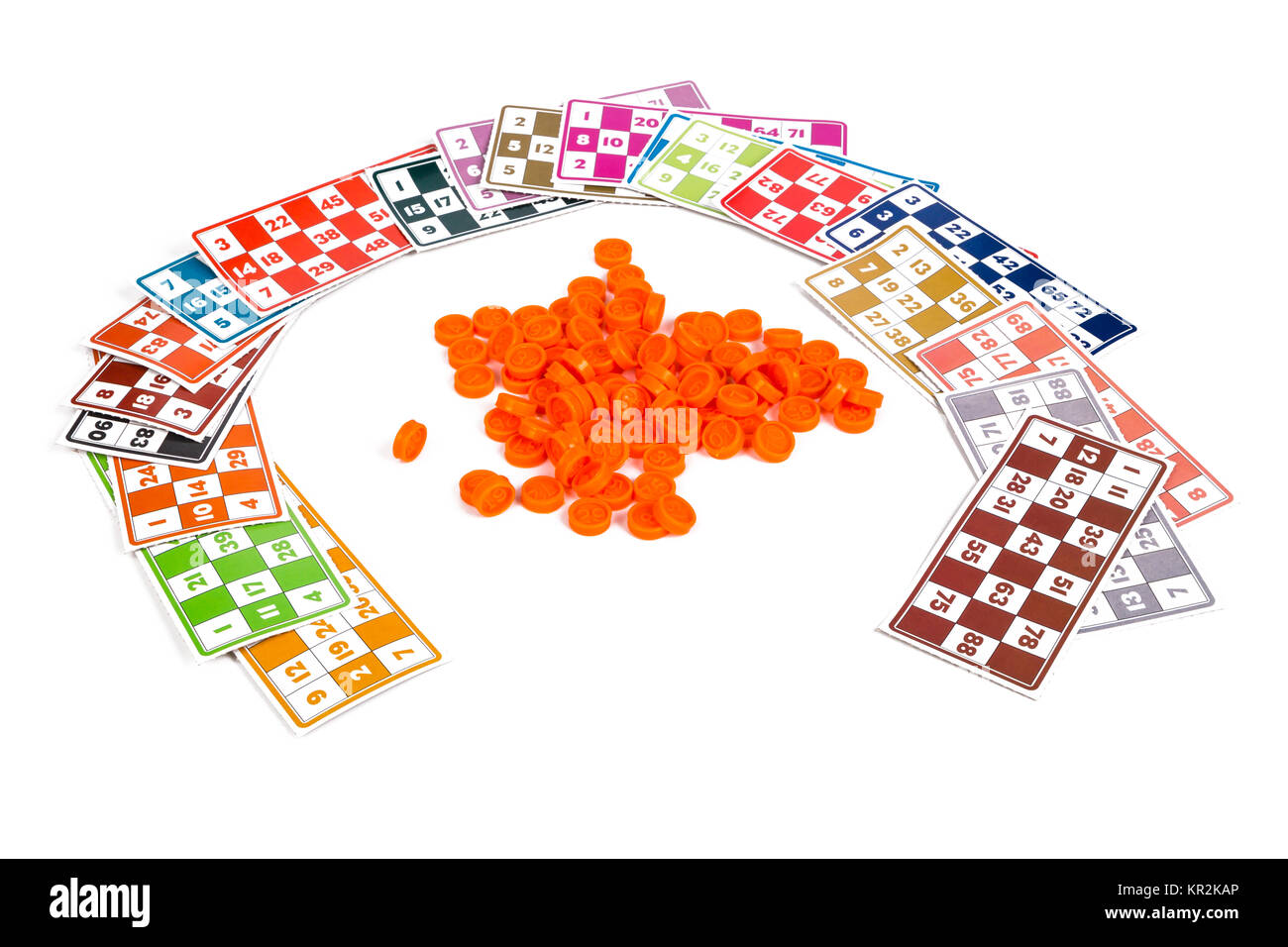 Colorful lotto or bingo game papers with numbers and plastic lotto ...