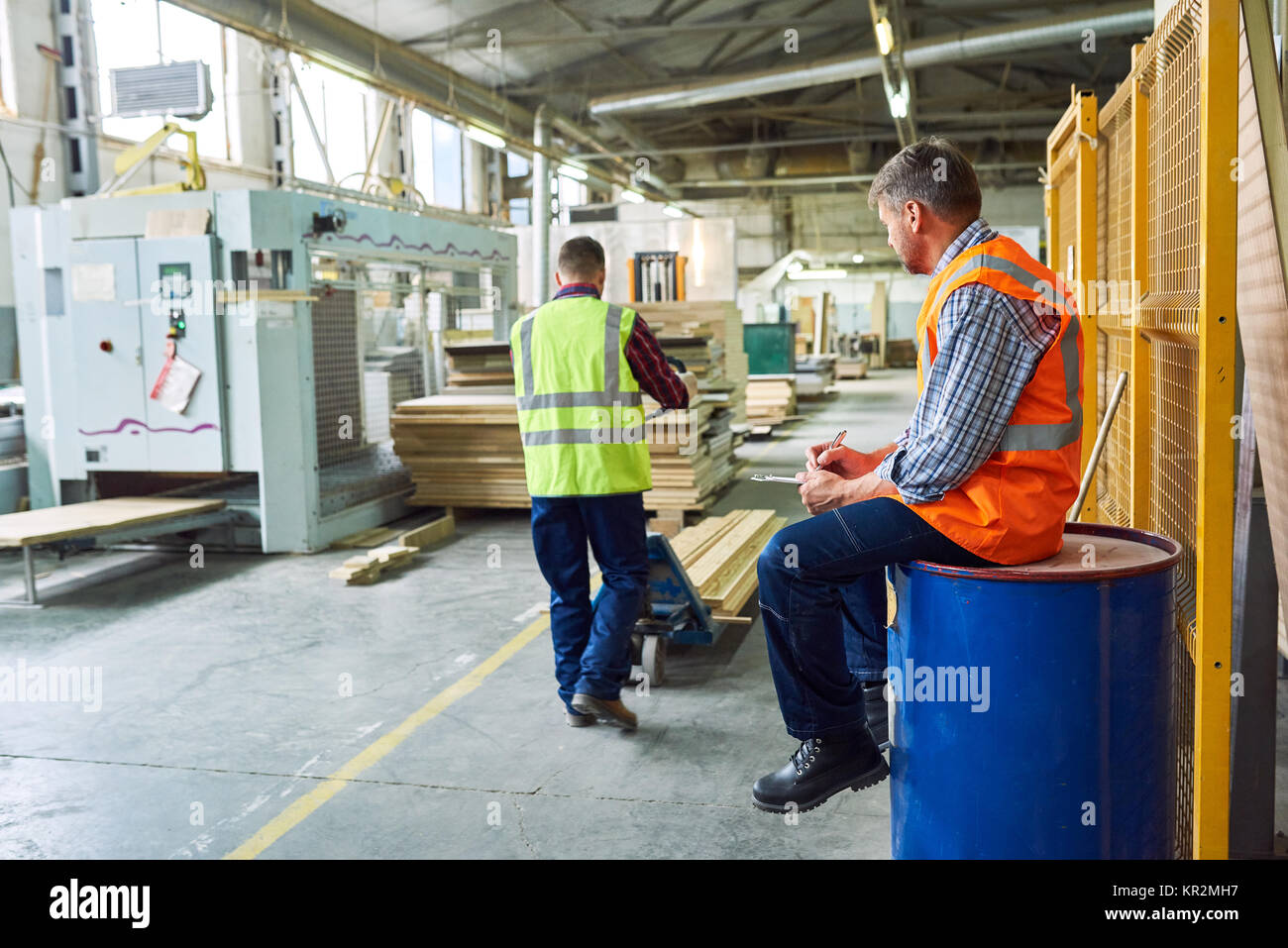 Work Process in Wood Warehouse Stock Photo - Alamy
