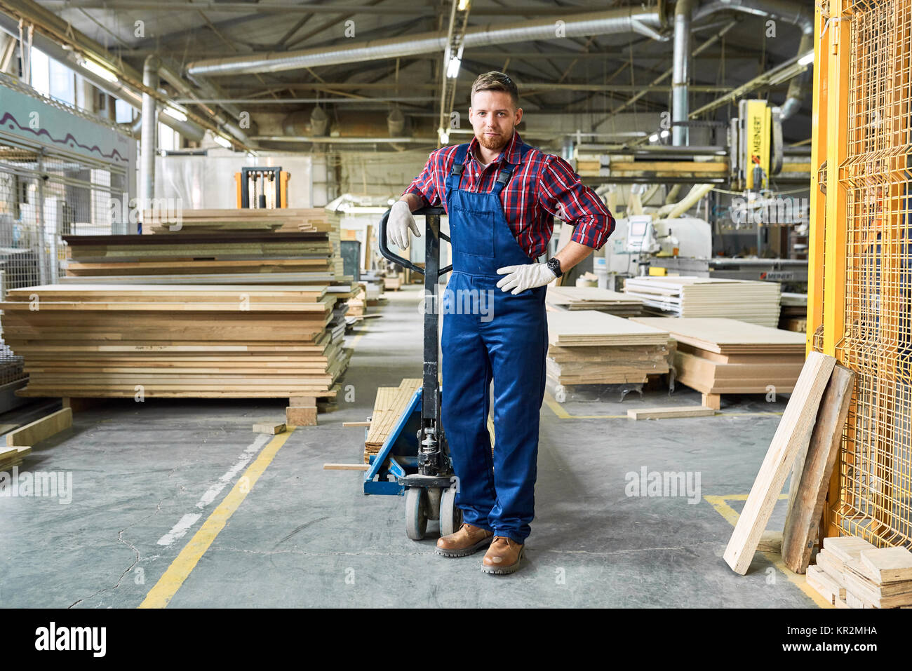 Man worker pulling cart hi-res stock photography and images - Alamy
