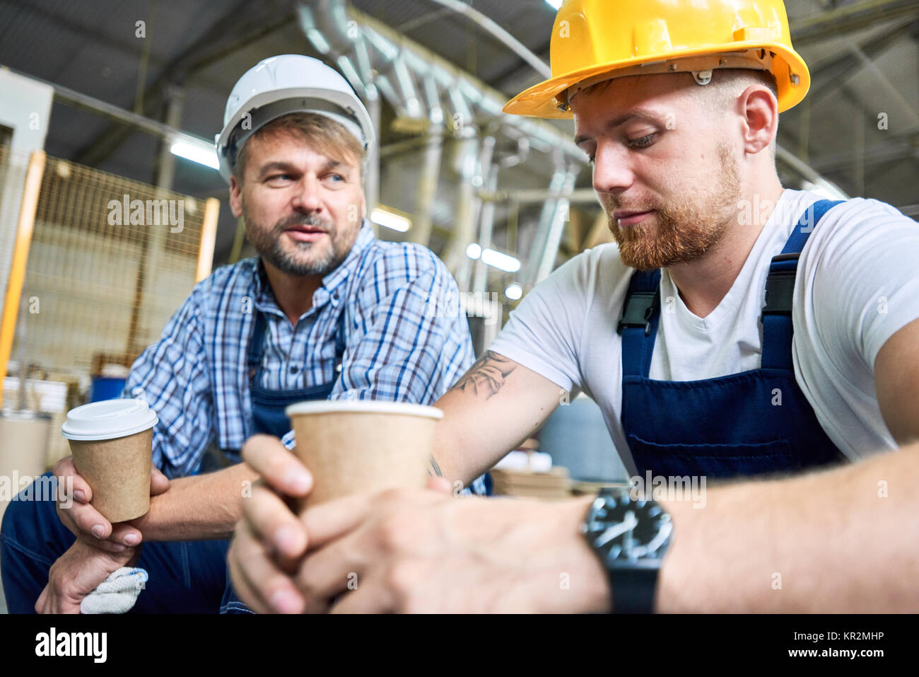 Builders on Coffee Break Stock Photo - Alamy