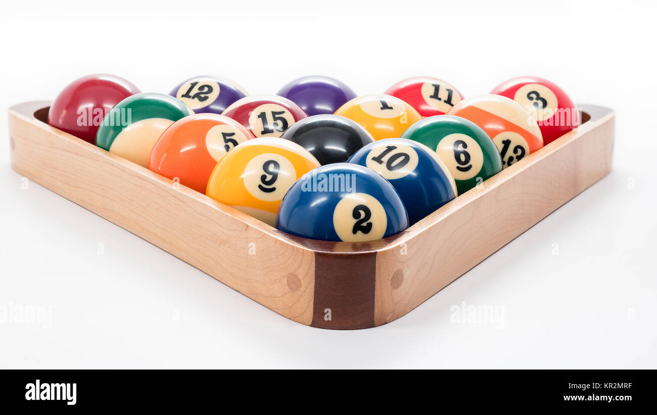 Rack putting together a collection of balls to play pool with Stock ...