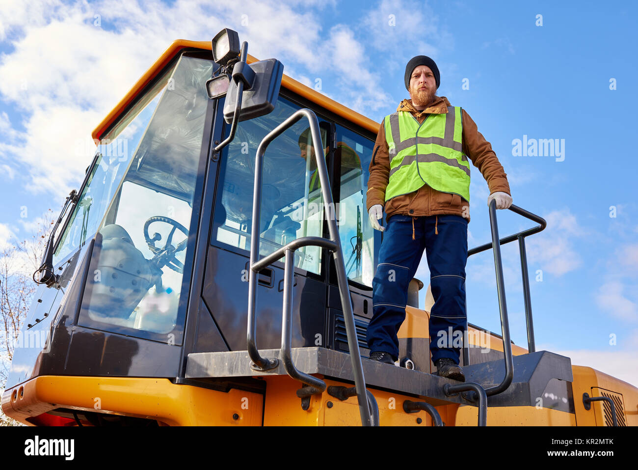 Bearded Gold Miner Posing on Truck Stock Photo - Alamy