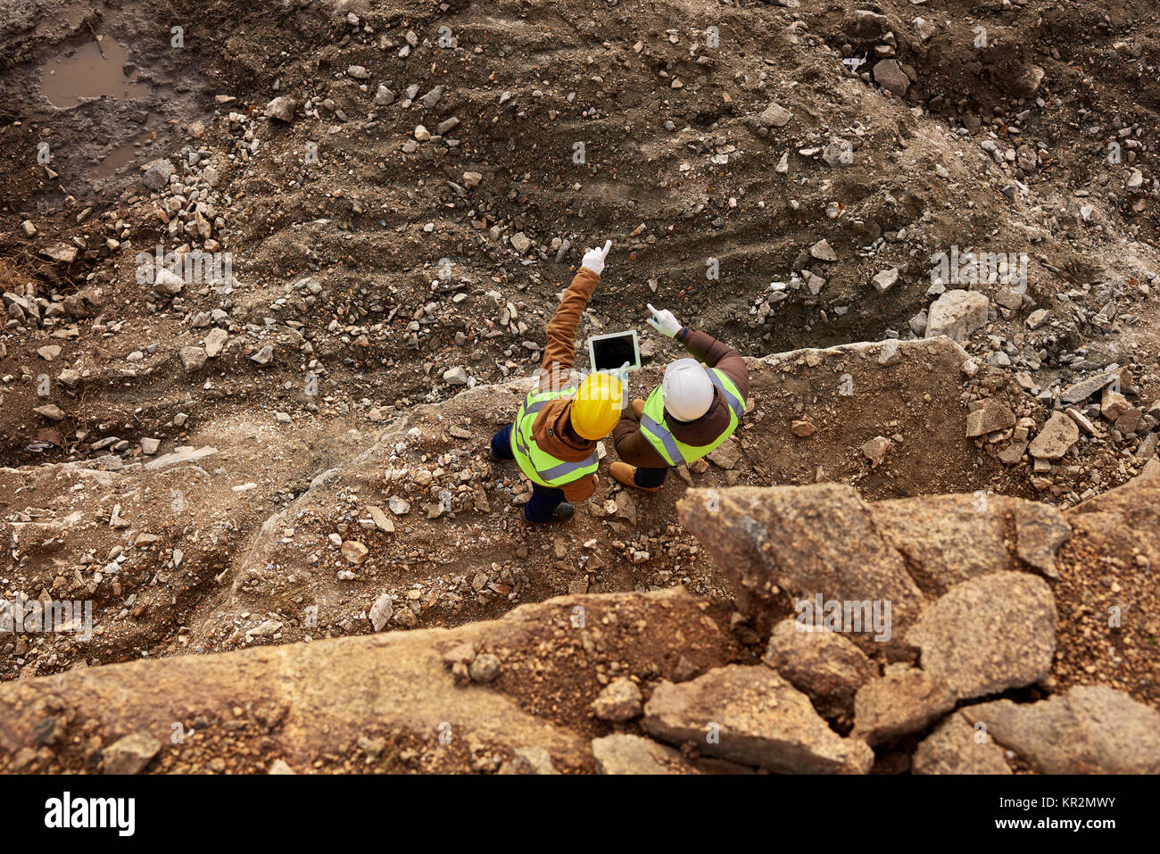 Construction Workers Inspecting Site Stock Photo - Alamy
