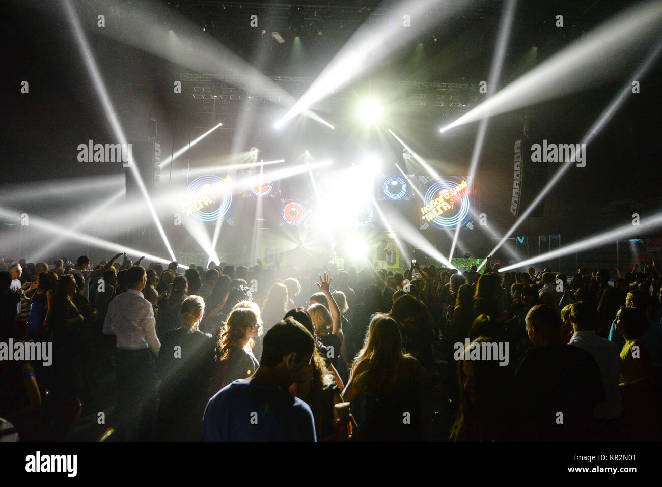 The audience watching the concert on stage in big concert club Stock ...