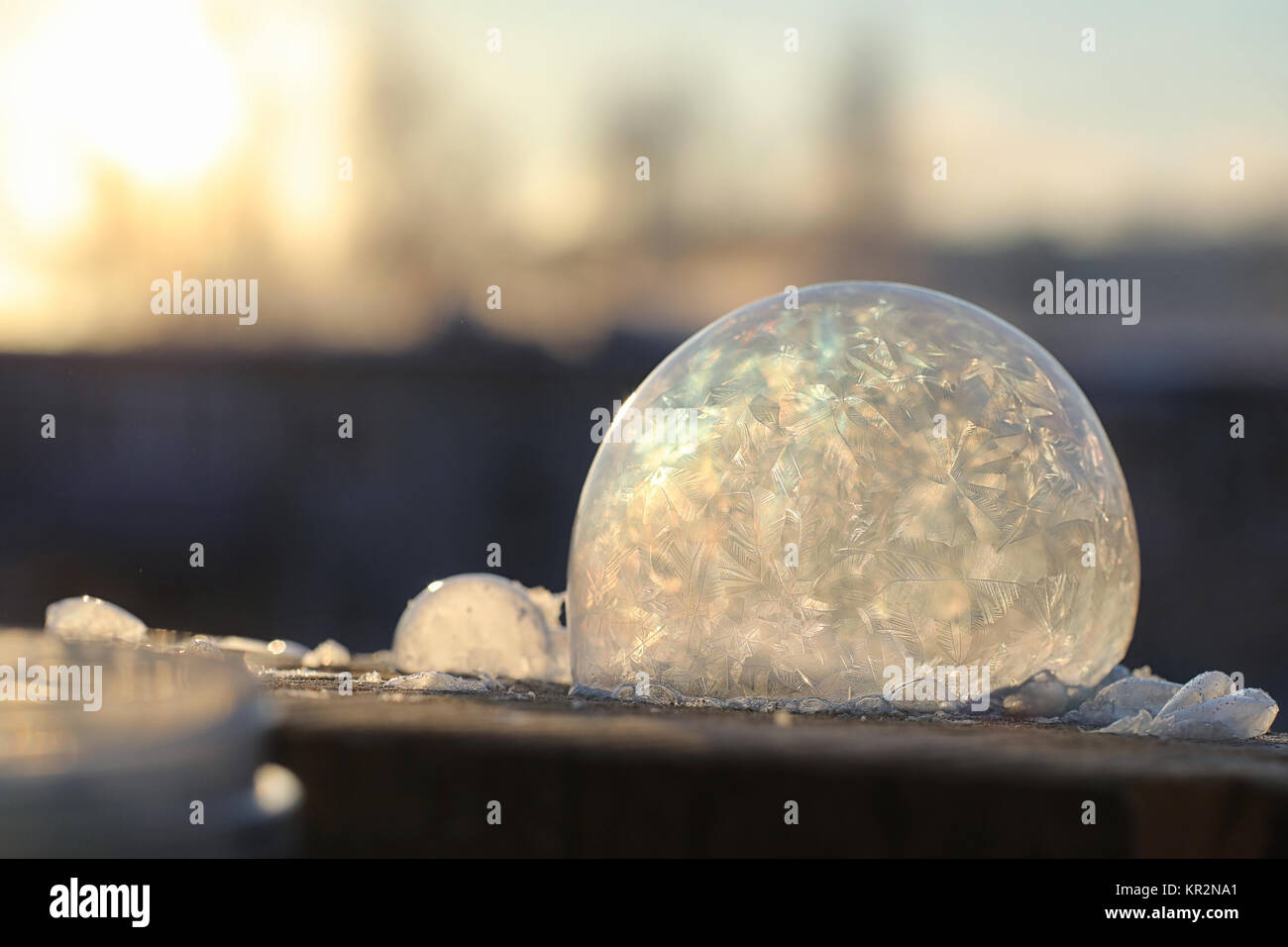 Soap bubbles freeze in the cold. Winter soapy water freezes in t Stock ...