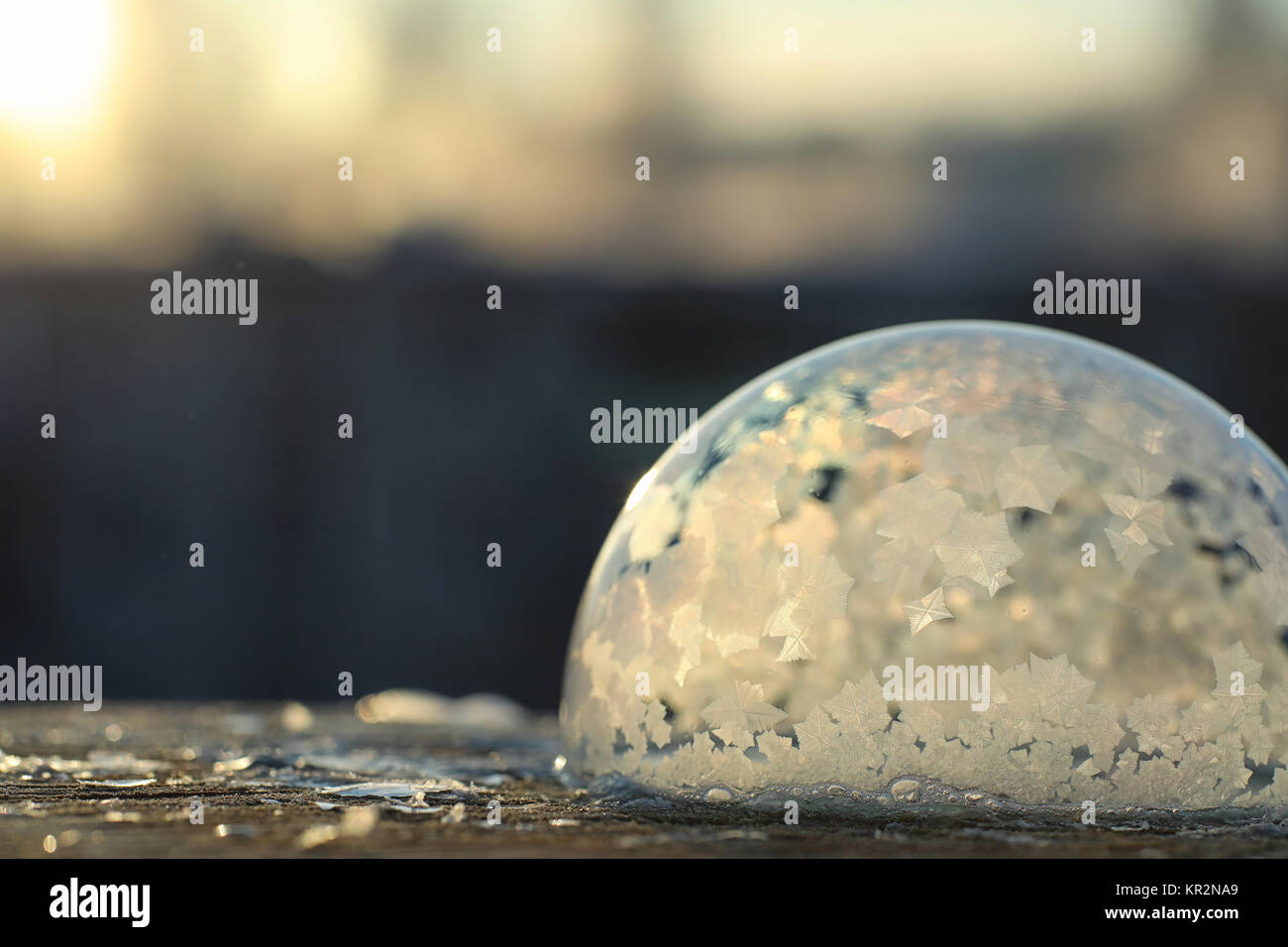 Soap bubbles freeze in the cold. Winter soapy water freezes in t Stock ...