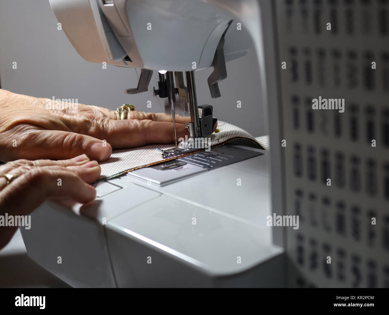 Caucasian woman operating sewing hi-res stock photography and images ...
