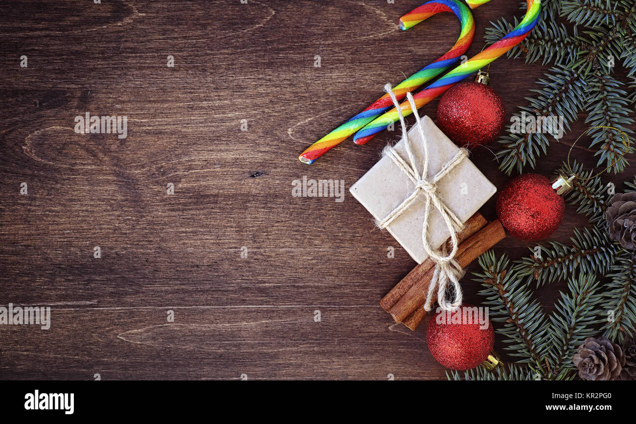 New Year's background. Spruce branches on a wooden table. Orname Stock ...