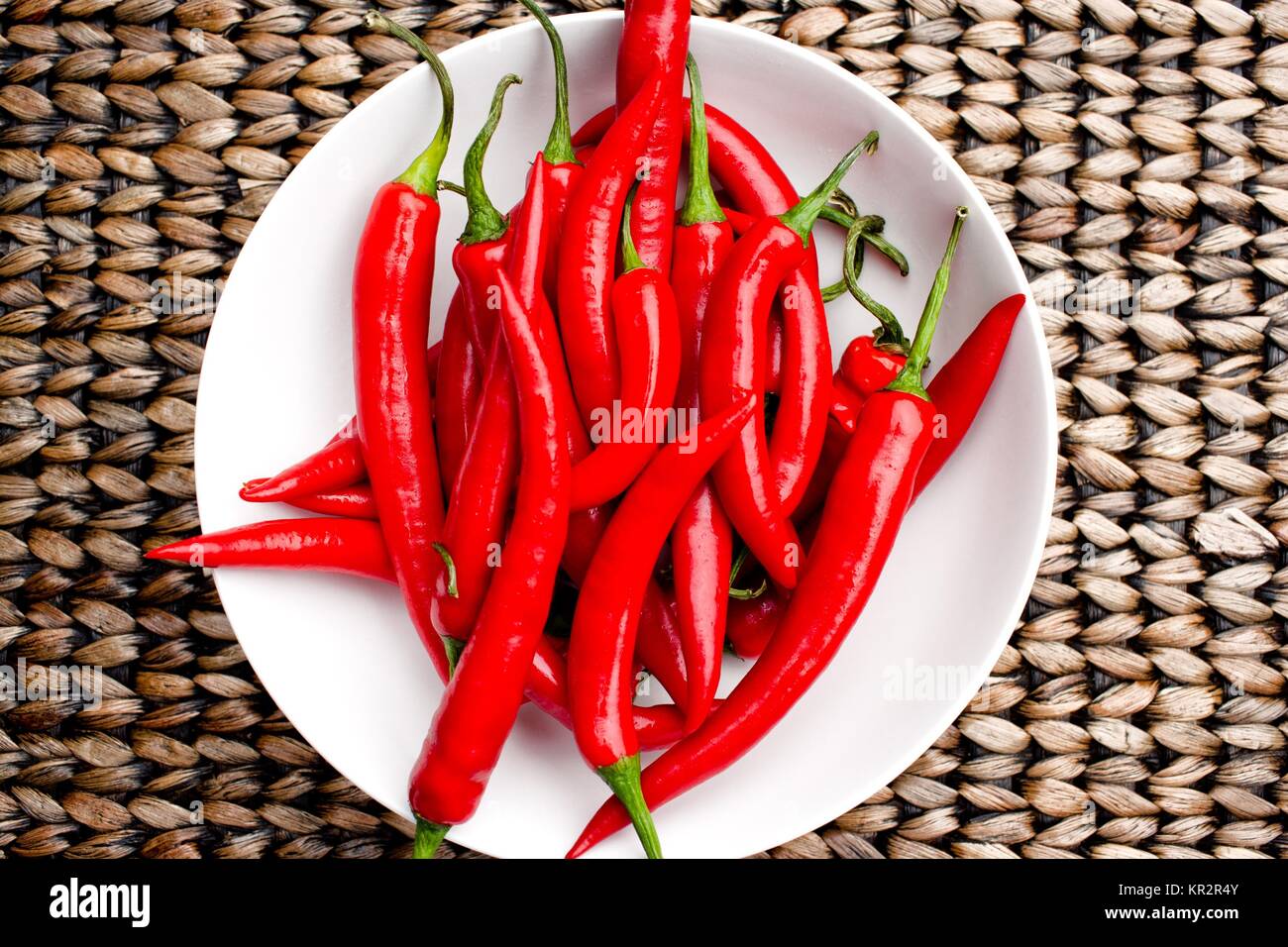 Plate of Red Peppers Stock Photo - Alamy