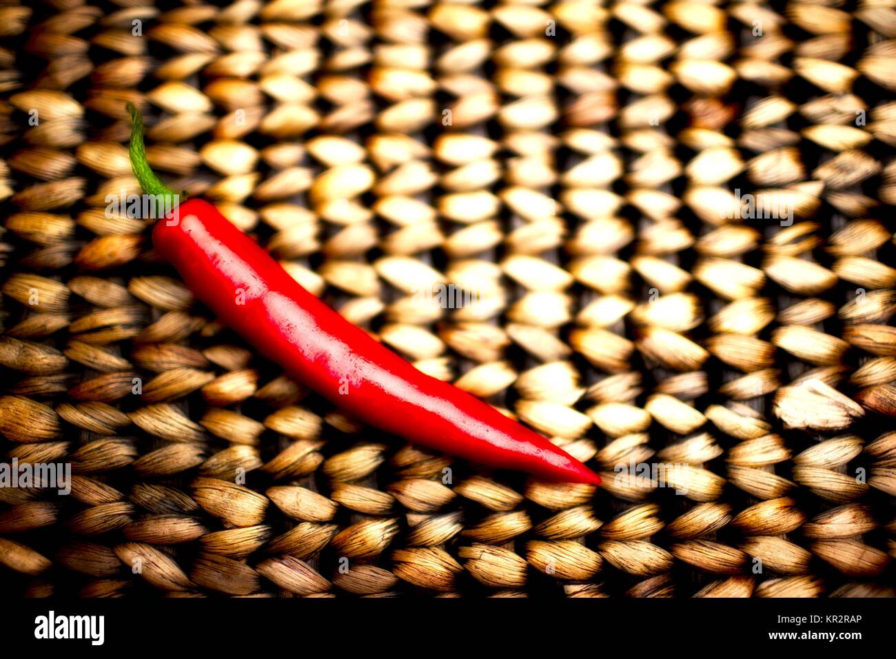 Red Pepper on a Patterned Surface Stock Photo - Alamy