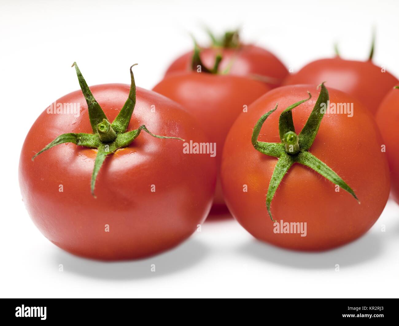 six tomatoes low angle Stock Photo - Alamy