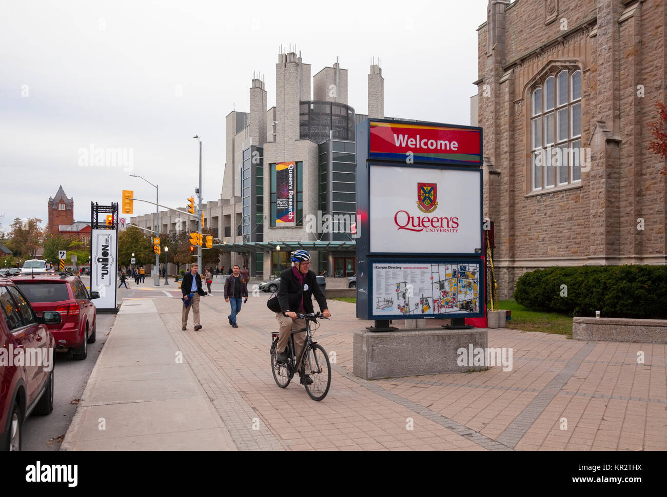 A Queen's University sign and the Joseph S Stauffer Library at Queen's ...