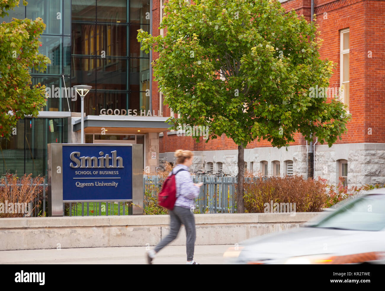 A student walking by Goodes Hall or The Smith School of Business at ...