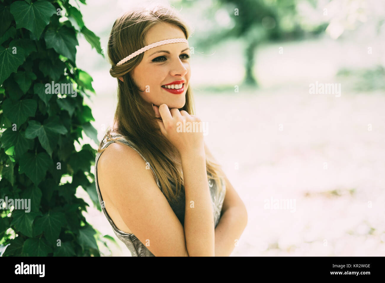 Happy cheerful female in nature Stock Photo - Alamy